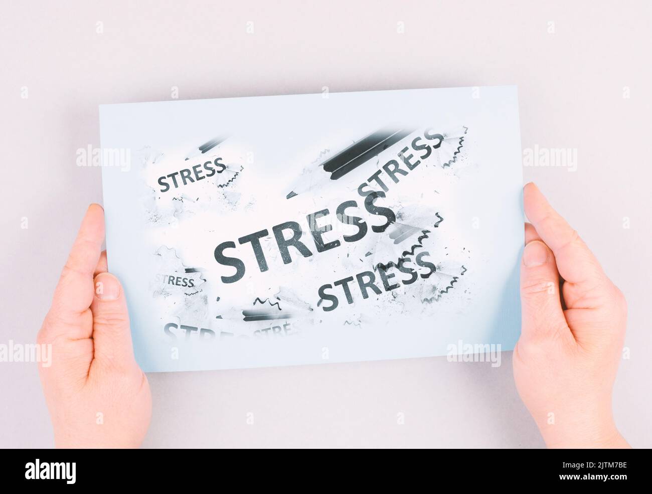 The word stress is standing on a paper, pen with eraser, burnout ...