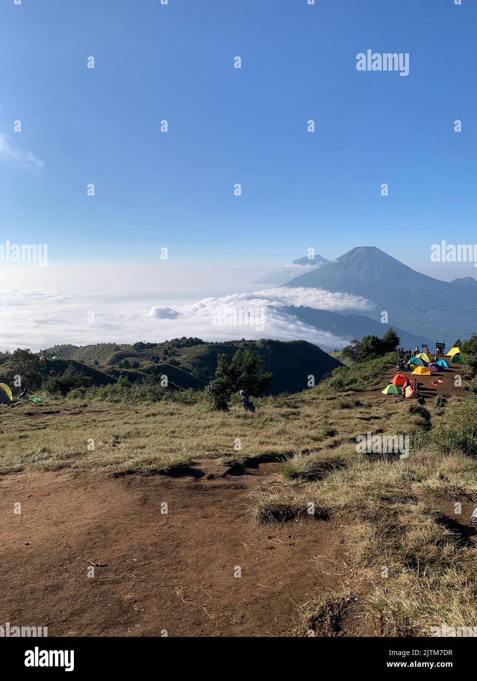 A vertical view of Mount Prau with Mount Sindoro and Mount Sumbing in ...
