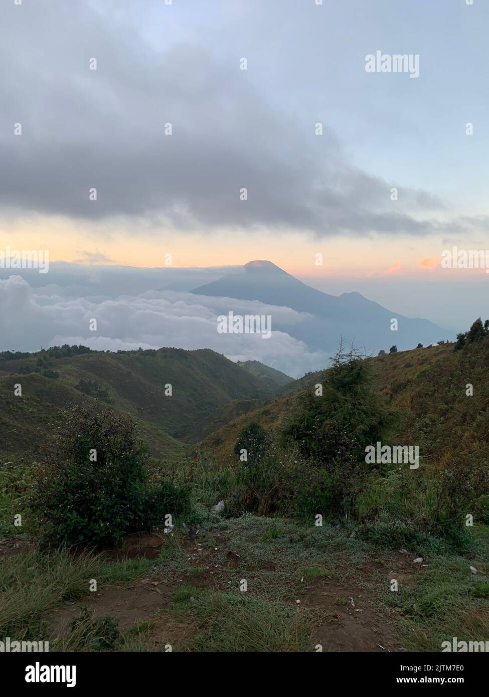 A vertical view of Mount Prau with Mount Sindoro and Mount Sumbing in ...