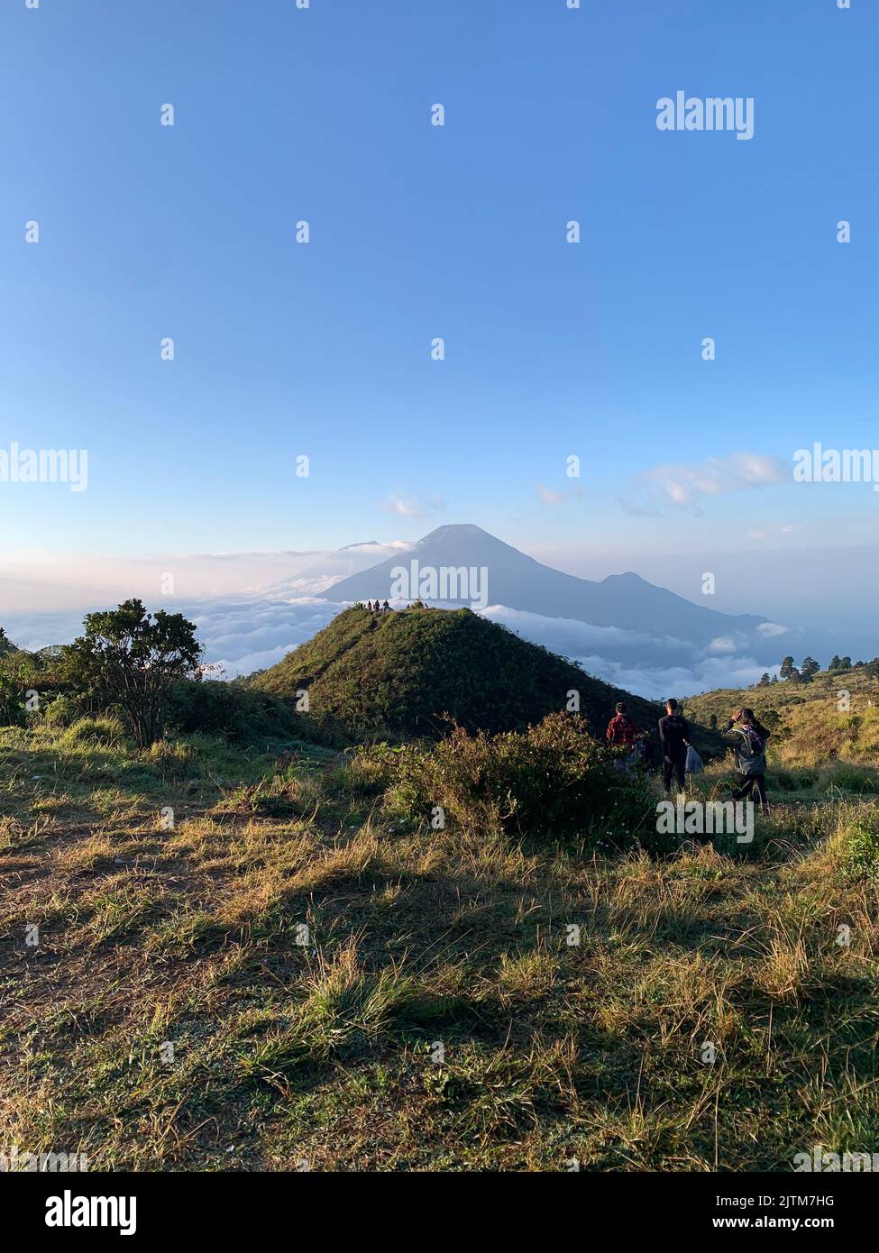 A vertical view of Mount Prau with Mount Sindoro and Mount Sumbing in ...