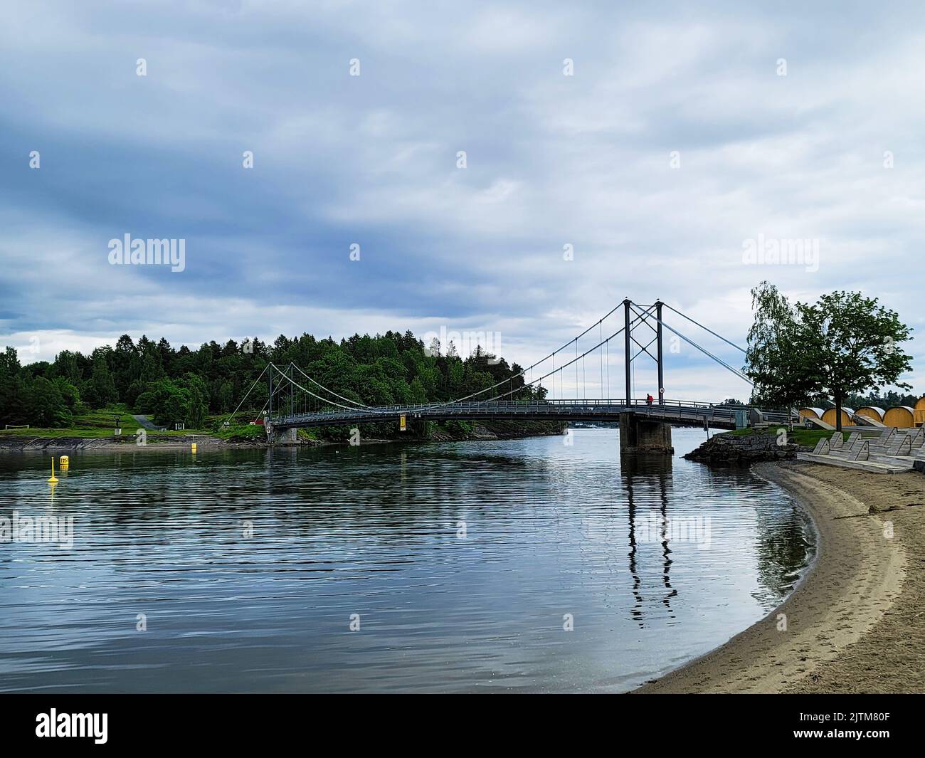 The beautiful park scene with the bridge over the river Stock Photo - Alamy