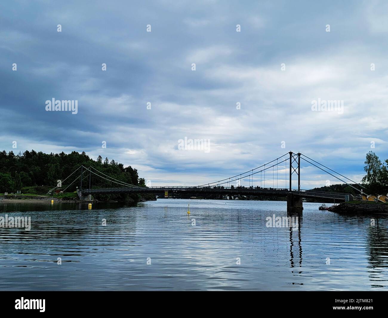 The Beautiful park scene with the bridge over the river Stock Photo - Alamy