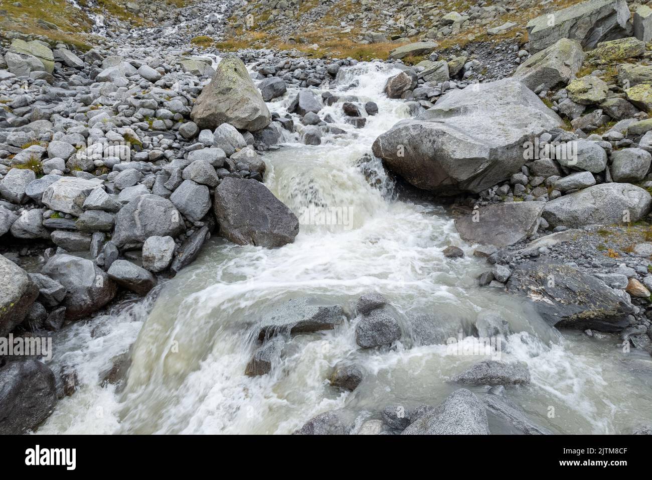 Cristal clear alpine stream with fresh water in the Austrian Alps Stock ...