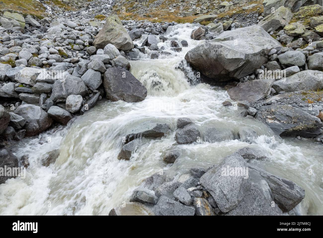 Cristal clear alpine stream with fresh water in the Austrian Alps Stock ...