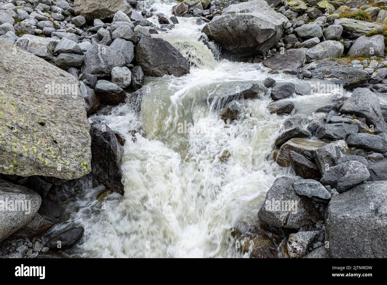 Cristal clear alpine stream with fresh water in the Austrian Alps Stock ...