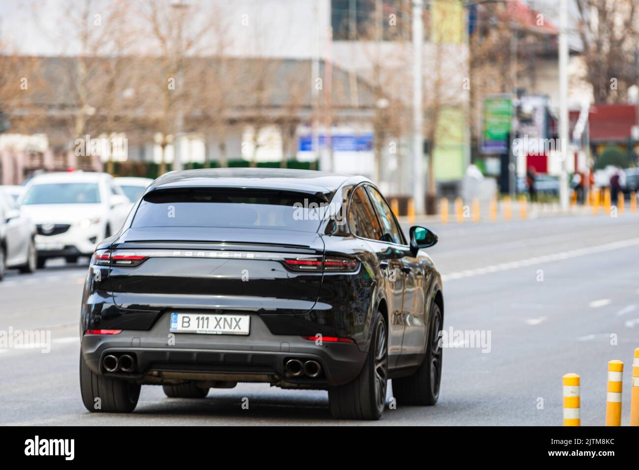 Porsche luxury car in traffic in Bucharest, Romania, 2022 Stock Photo ...