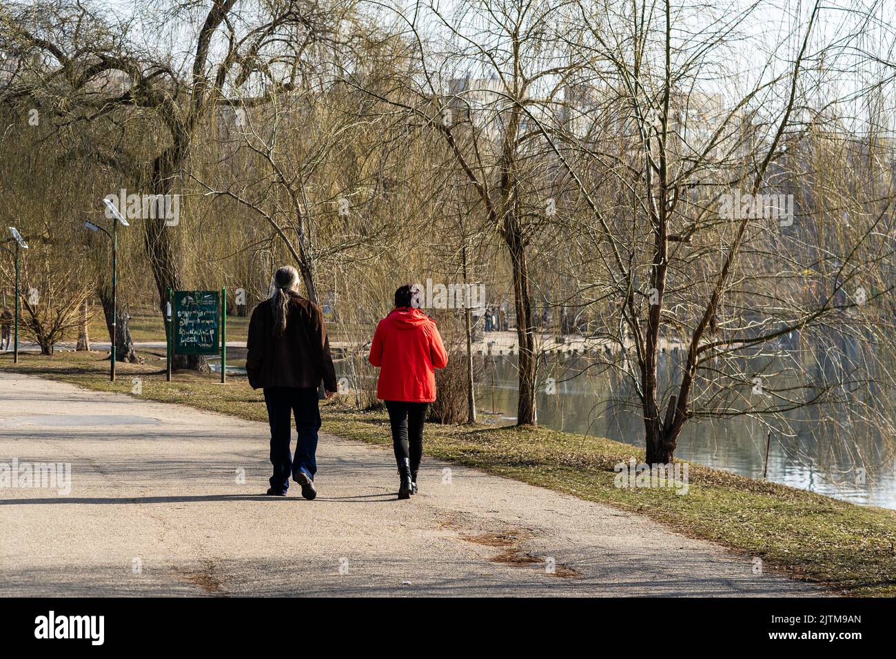 People and tourists wander the streets of the Bucharest Old Town ...