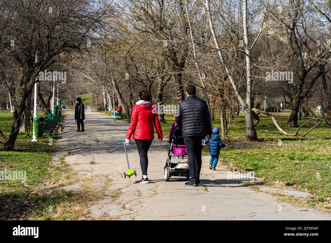 People and tourists wander the streets of the Bucharest Old Town ...