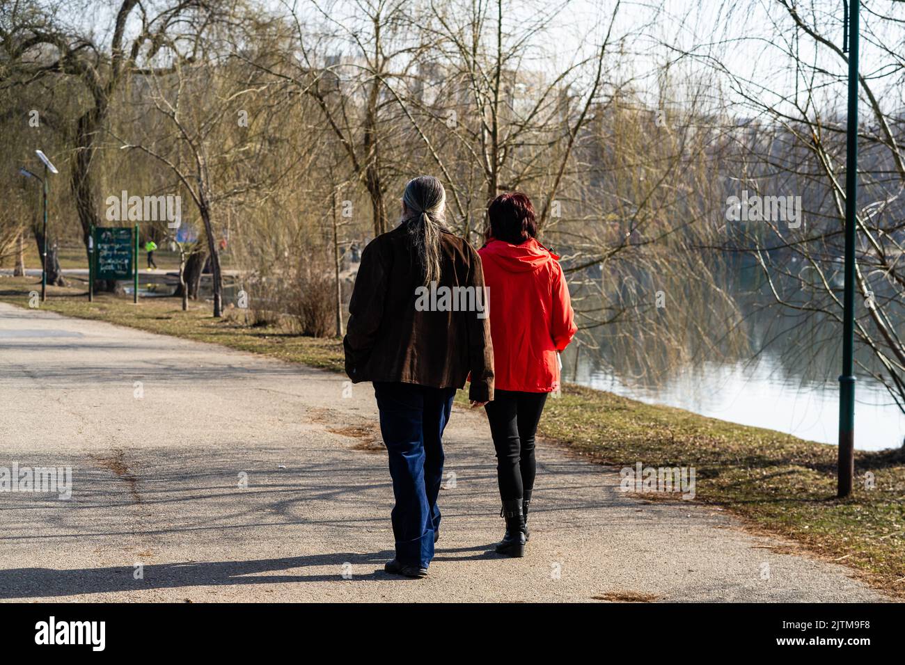 People and tourists wander the streets of the Bucharest Old Town ...