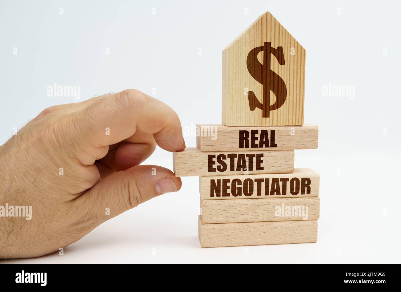 Real estate and business. On wooden blocks with the inscription - Real ...