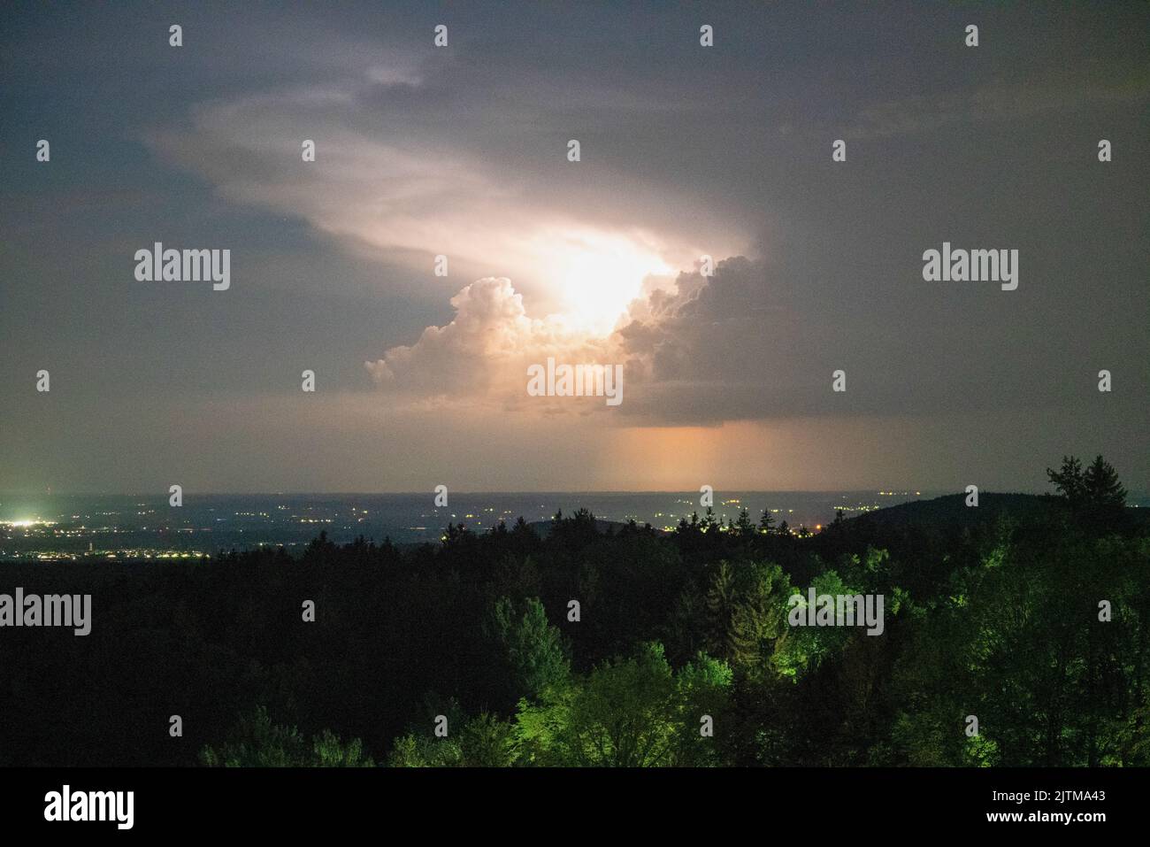 Thunderstorm in the Bavarian Forest with dark clouds and bright sheet ...