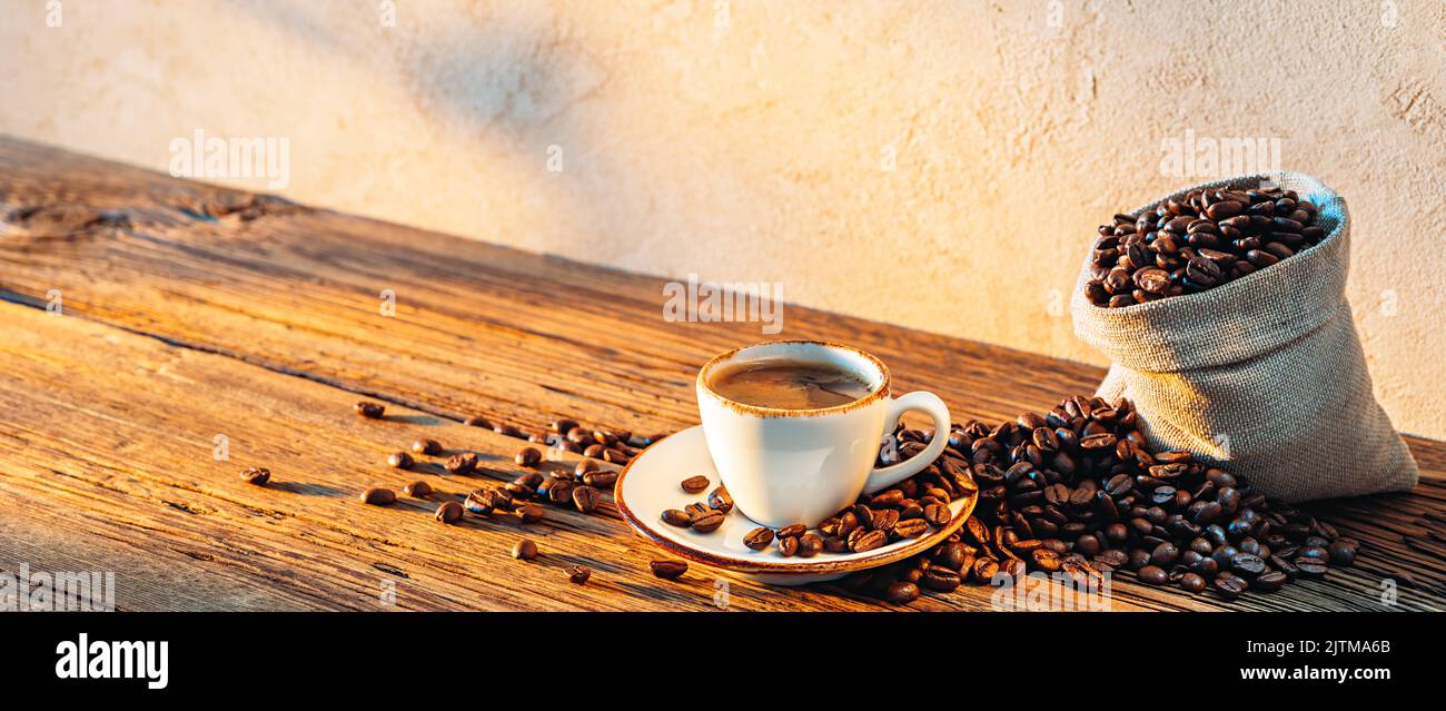 Morning cup of espresso coffee in sunlight Stock Photo - Alamy