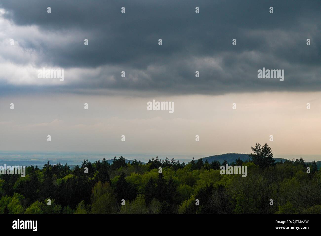 Thunderstorm in the Bavarian Forest with dark clouds and bright sheet ...