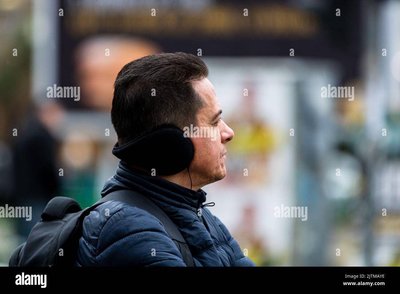 People and tourists wander the streets of the Bucharest Old Town ...