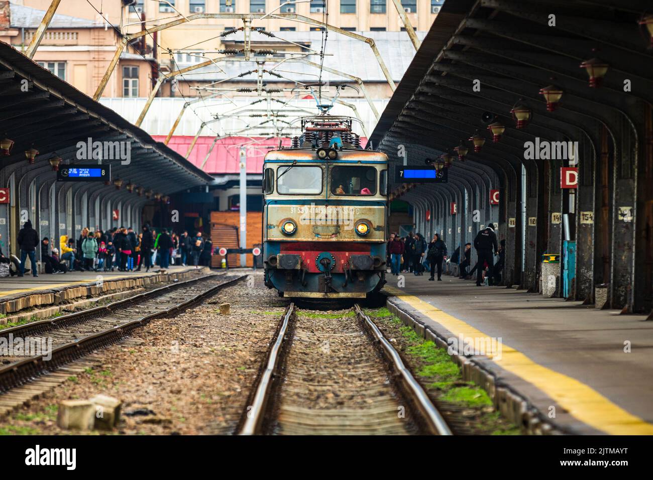 Train in motion or at train platform at Bucharest North Railway Station ...