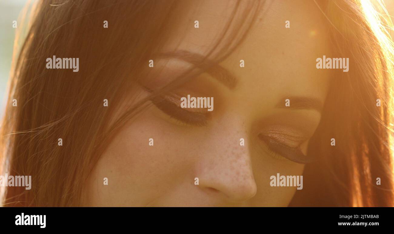 Closeup of pretty girl eyes looking to camera. Young woman in hero 20s ...