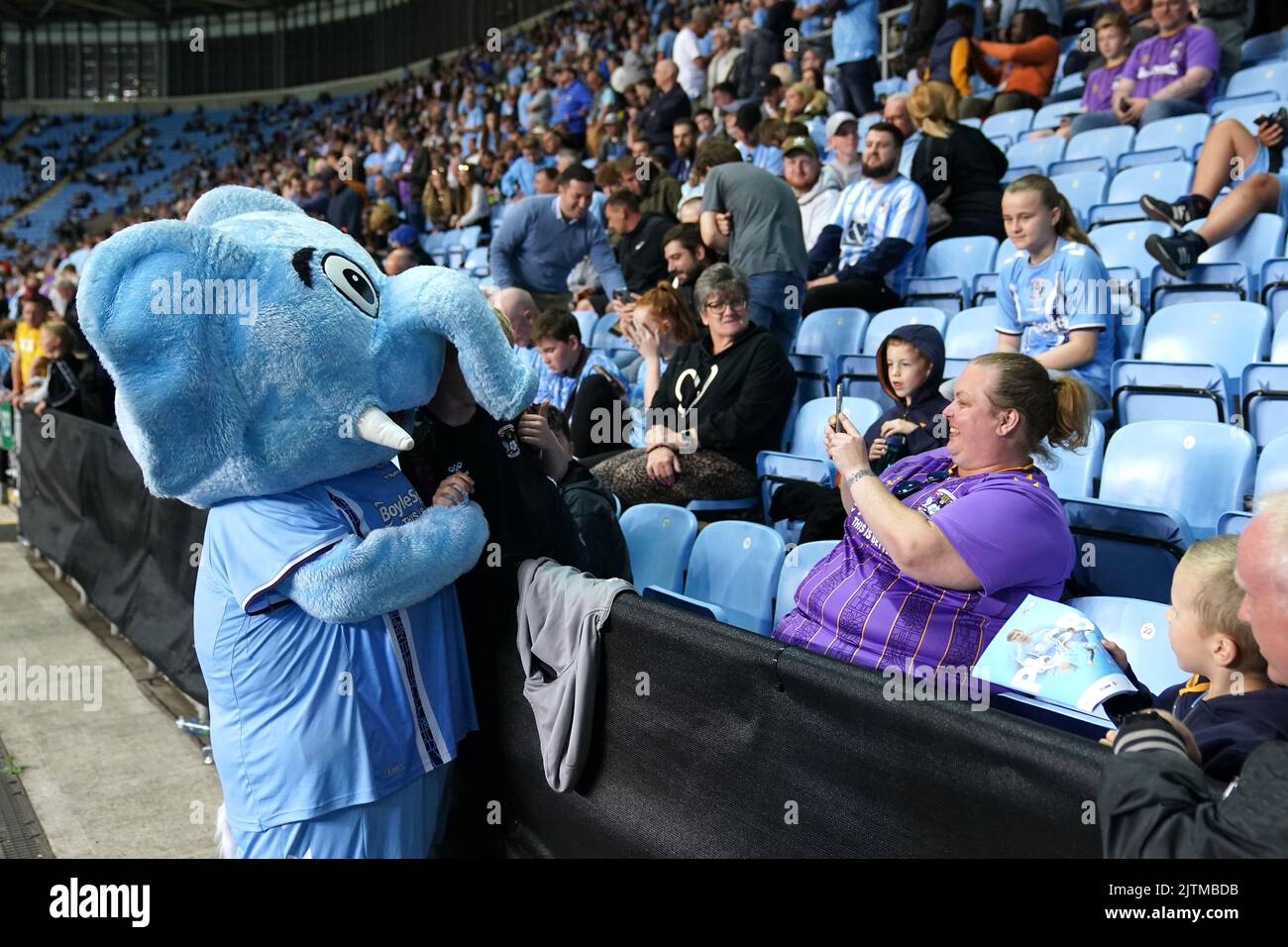 Coventry City mascot Sky Blue Sam meets fans at half time during the ...