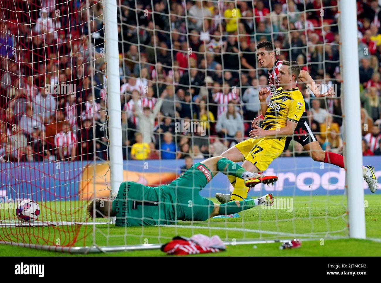 Sunderland's Ross Stewart scores their side's second goal of the game ...
