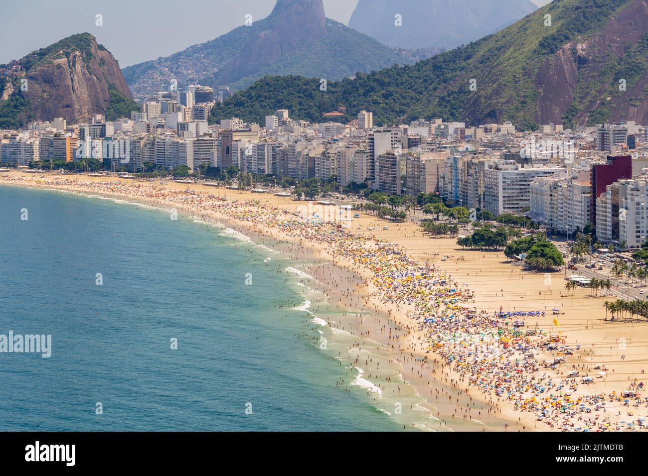 Copacabana beach full on a typical sunny Sunday in Rio de Janeiro ...