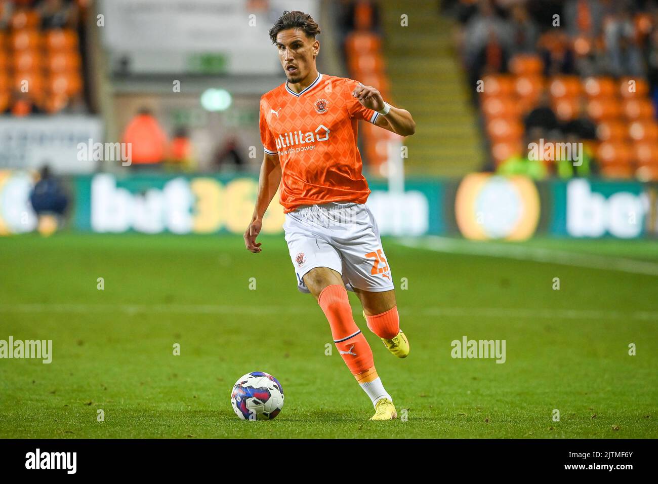 Theo Corbeanu #25 of Blackpool makes a break with the ball Stock Photo ...