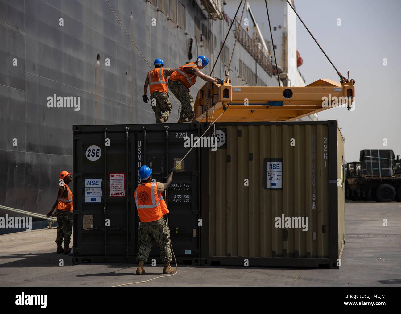 U.S. Navy Sailors with Navy Cargo Handling Battalion ONE aboard the ...