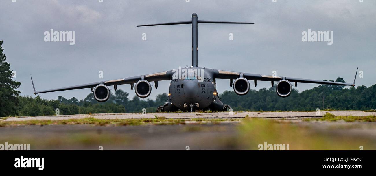 A U.S. Air Force C-17 Globemaster III assigned to Joint Base Charleston, S.C. taxis on a runway ...