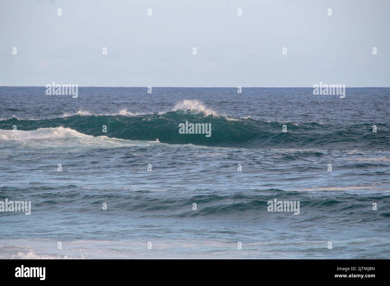 Wave breaking on the third slab of Arpoador beach in Rio de Janeiro ...