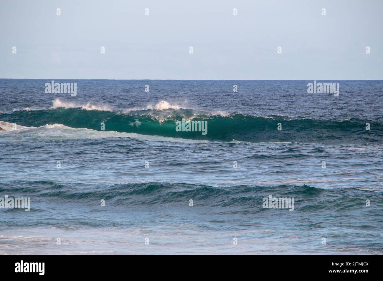Wave breaking on the third slab of Arpoador beach in Rio de Janeiro ...