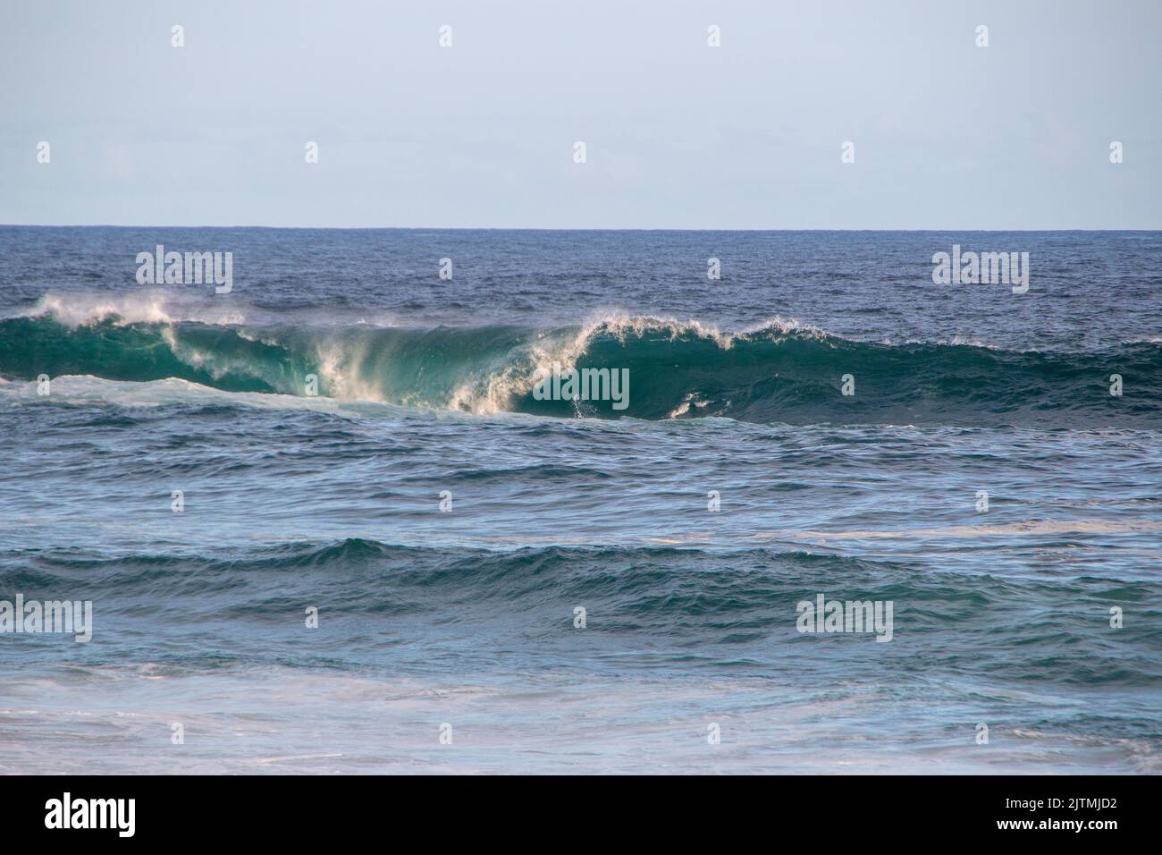 Wave breaking on the third slab of Arpoador beach in Rio de Janeiro ...