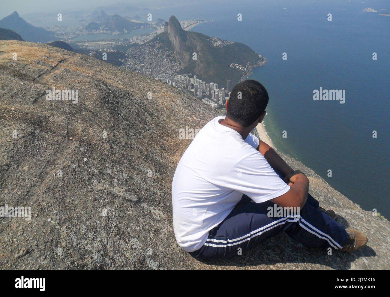 man admiring the look of the top of the Gavea stone ( pedra da gavea ...