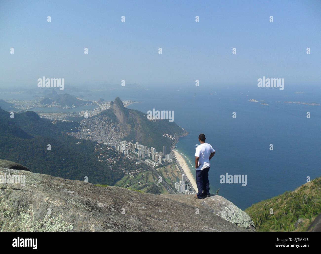 man admiring the look of the top of the Gavea stone ( pedra da gavea ...