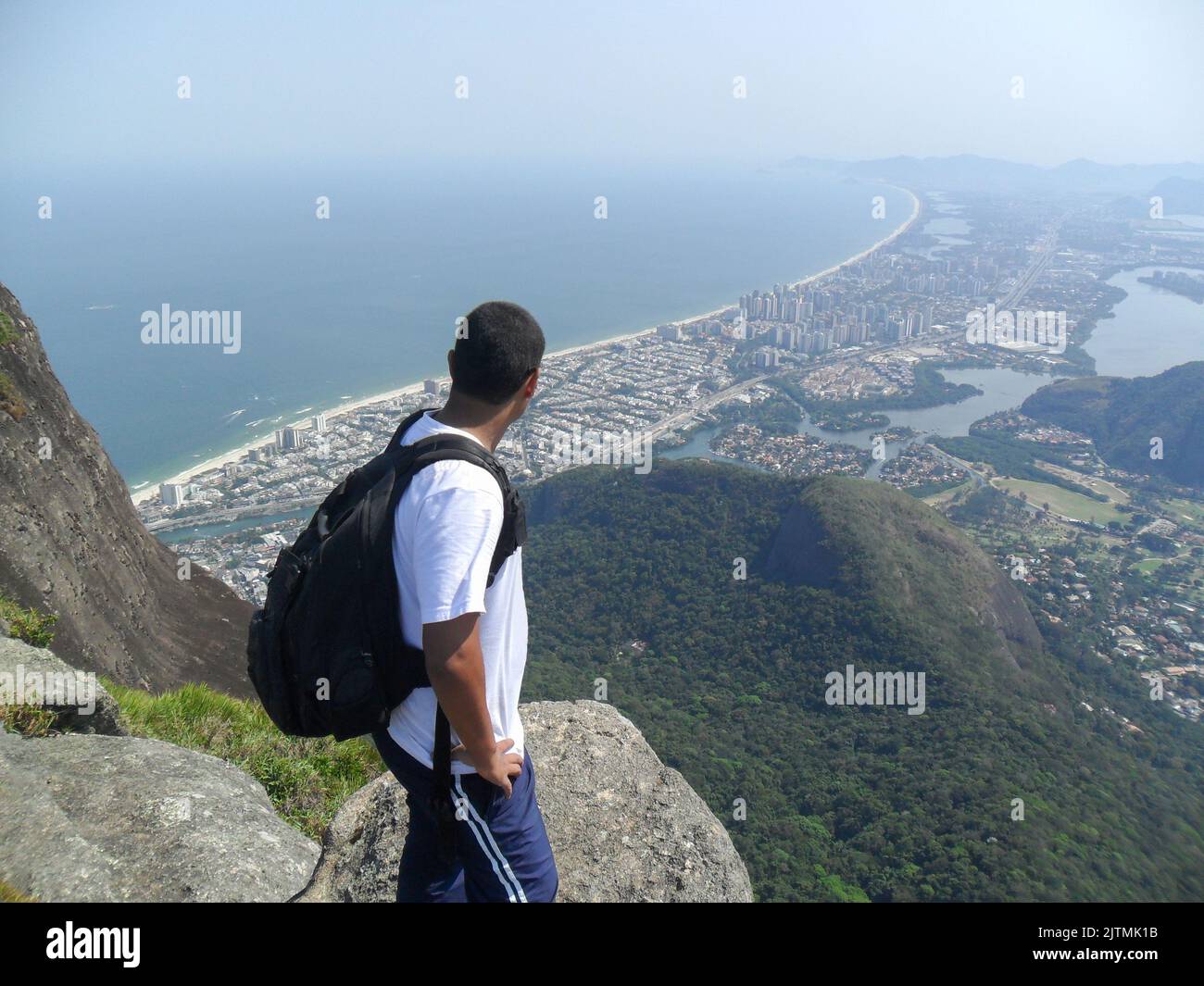 man admiring the look of the top of the Gavea stone ( pedra da gavea ...
