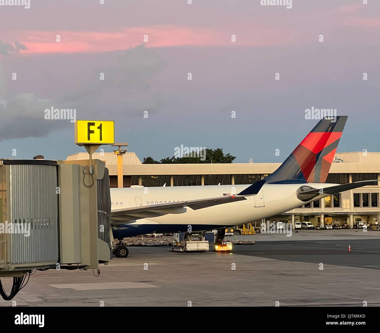 Delta Airlines aircraft park at the gate at Honolulu International ...