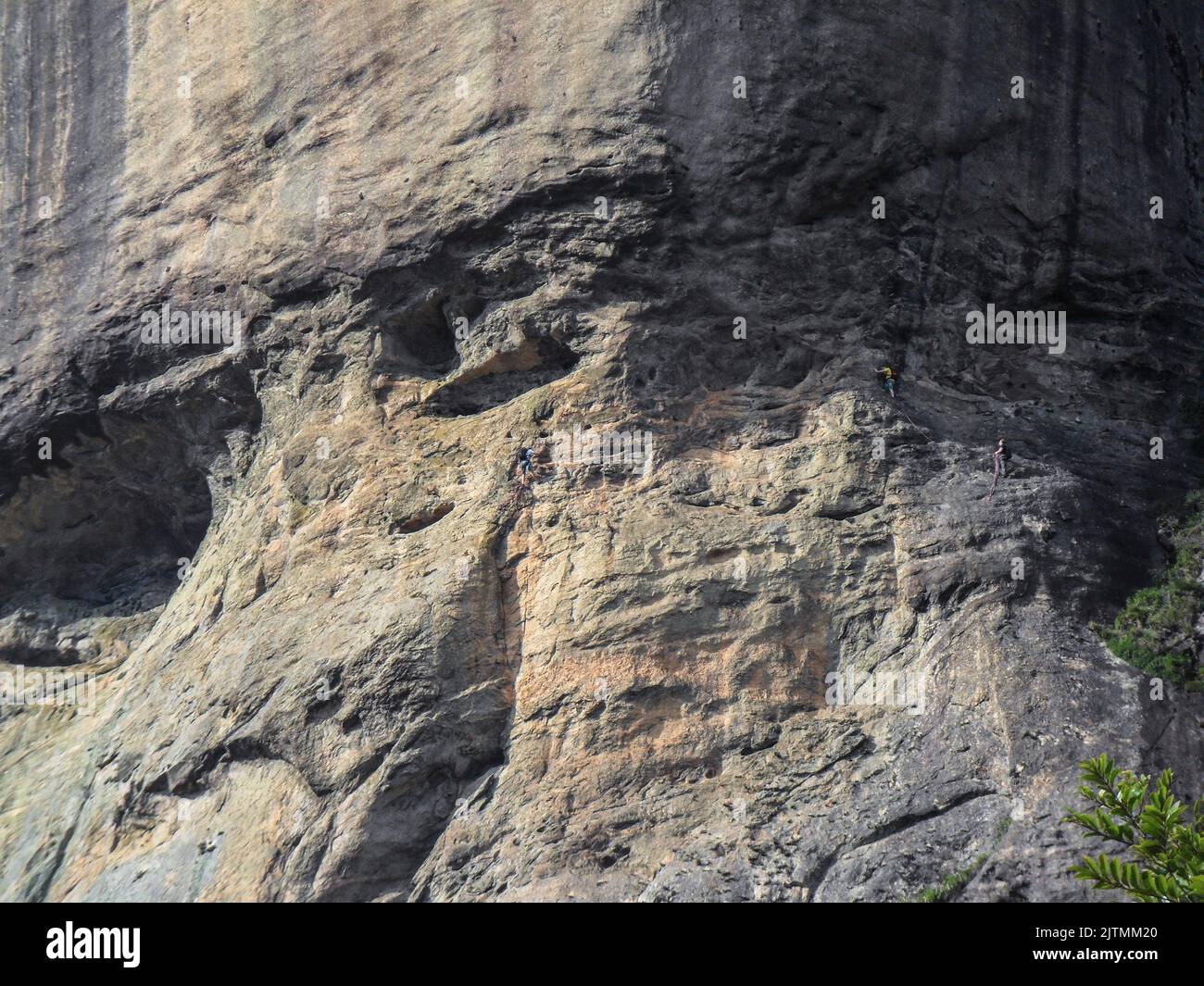 climbers doing one of the most classic routes in rio de janeiro, known ...