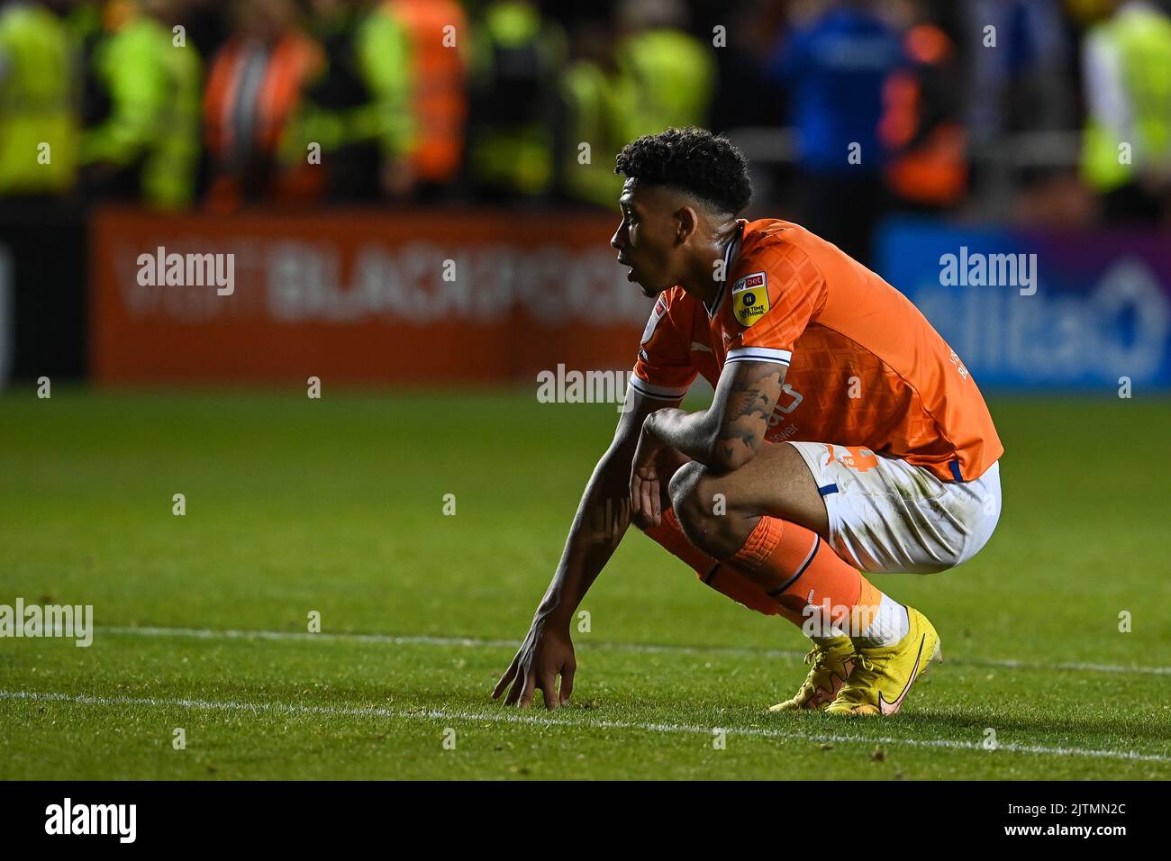 Jordan Lawrence-Gabriel #4 of Blackpool is dejected at the end of the ...