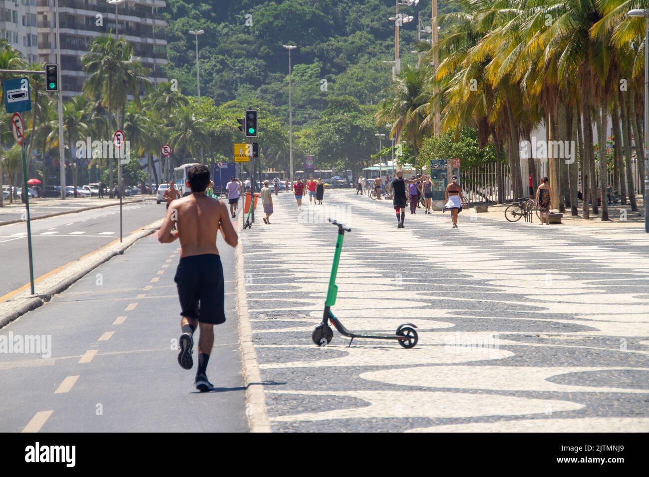 people walking on the copacabana boardwalk in Rio de Janeiro, Brazil ...