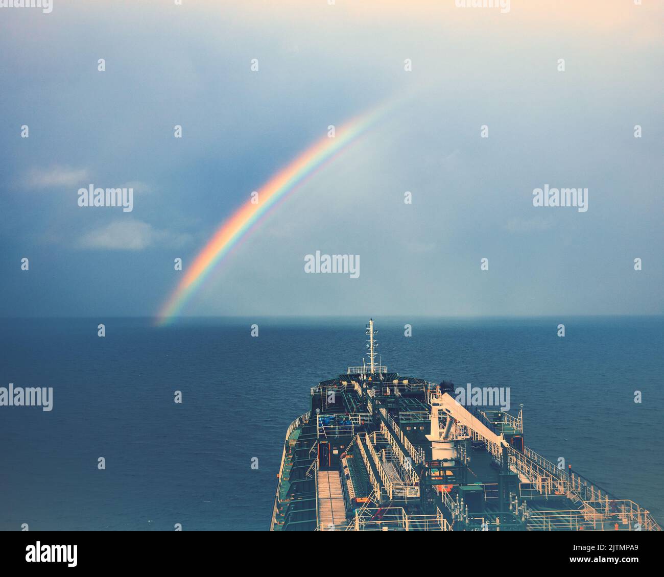 A view of the tanker in the water and a rainbow Stock Photo - Alamy