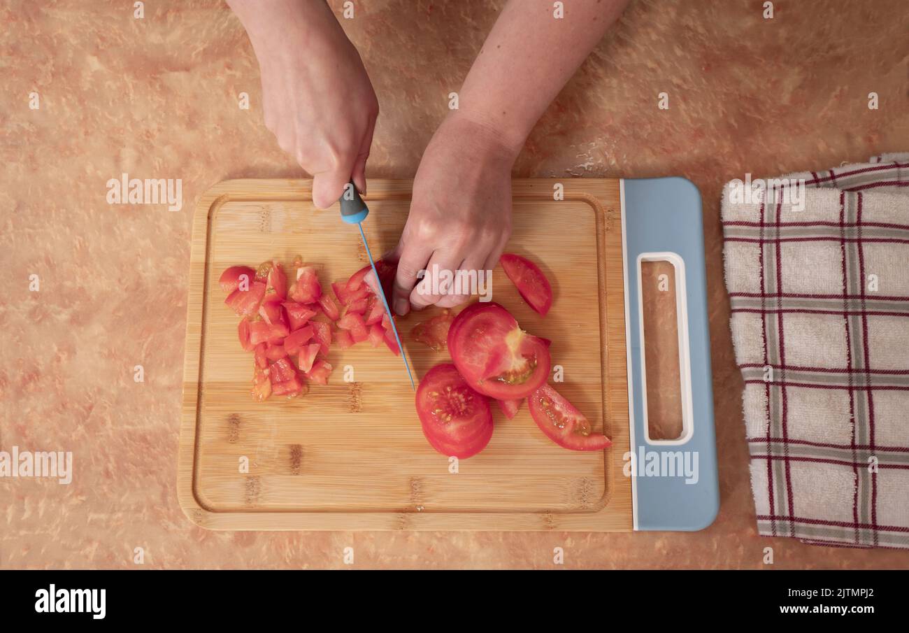 Woman kitchen towel chopping board hi-res stock photography and images - Alamy