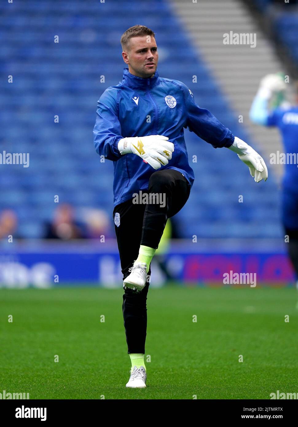 Queen of the South goalkeeper Max Currie warms up ahead of the Premier ...