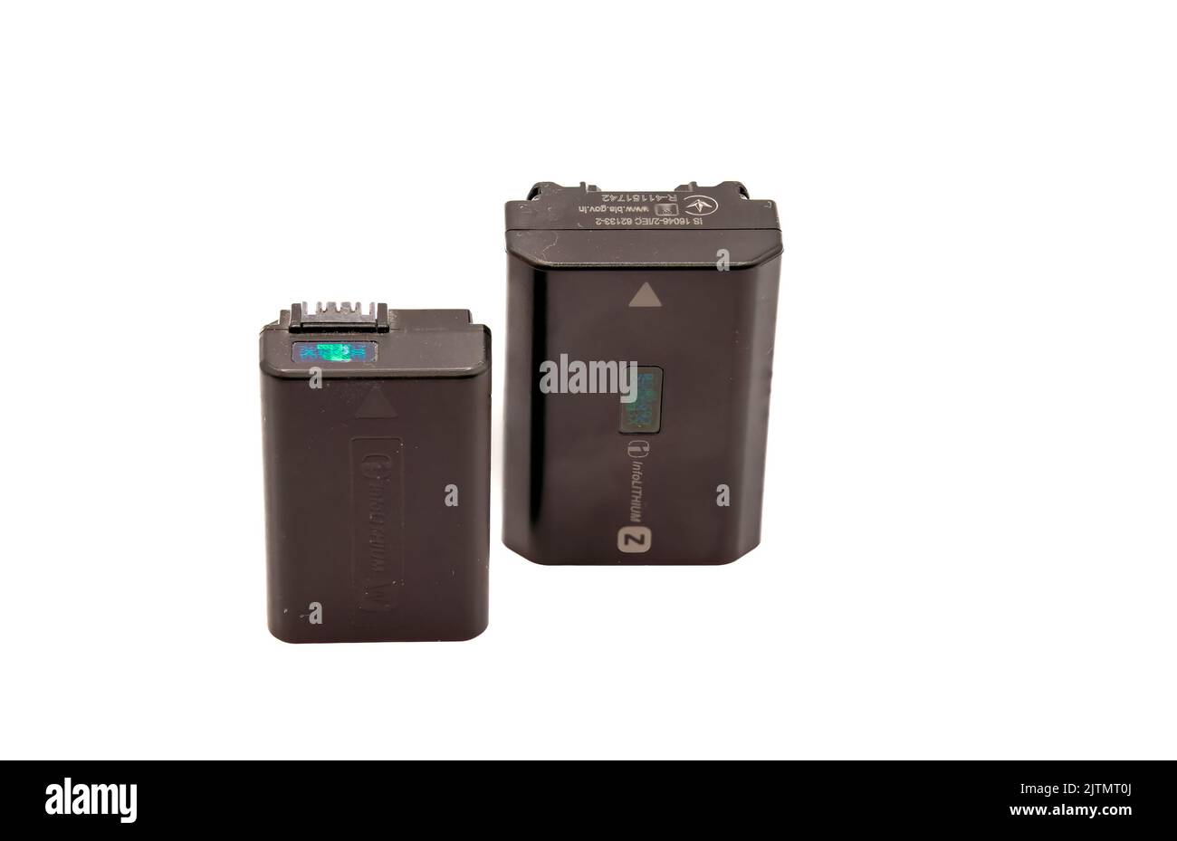 close-up of two different size Sony digital camera lithium ion ...