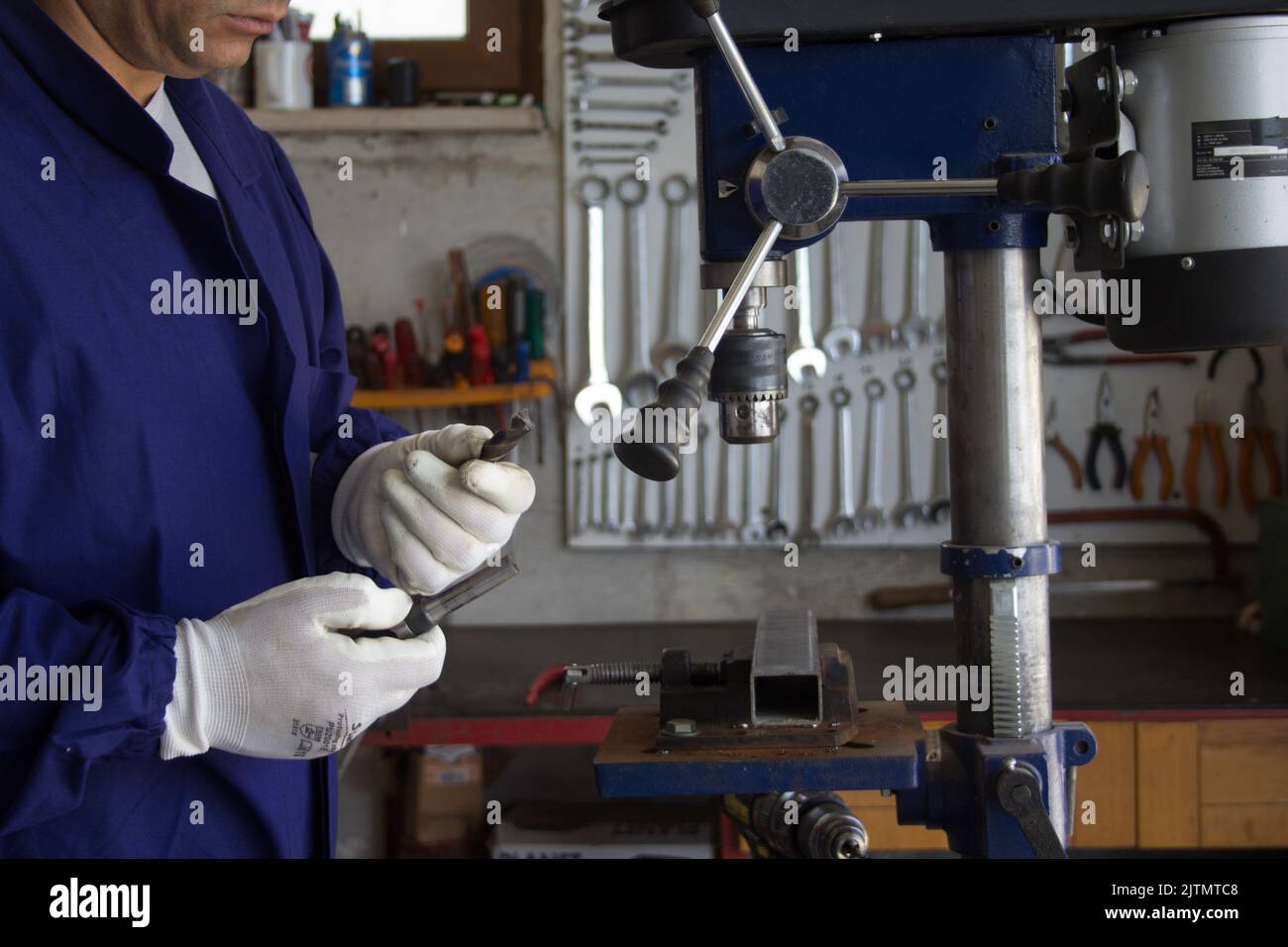 Image of a blacksmith showing a broken drill bit. Reference to poor ...