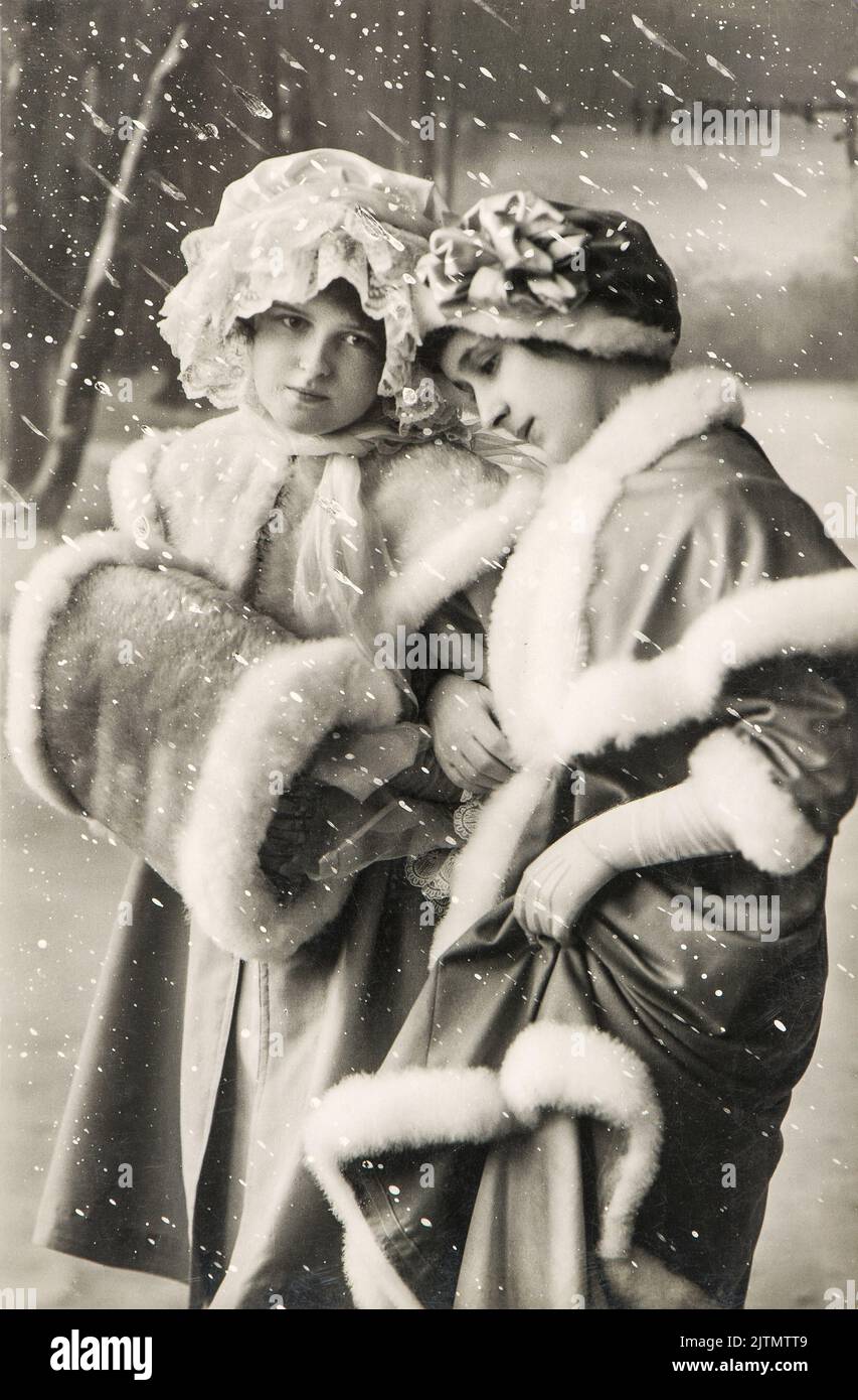 Vintage Christmas postcard. Girls in vintage winter clothing. Retro ...