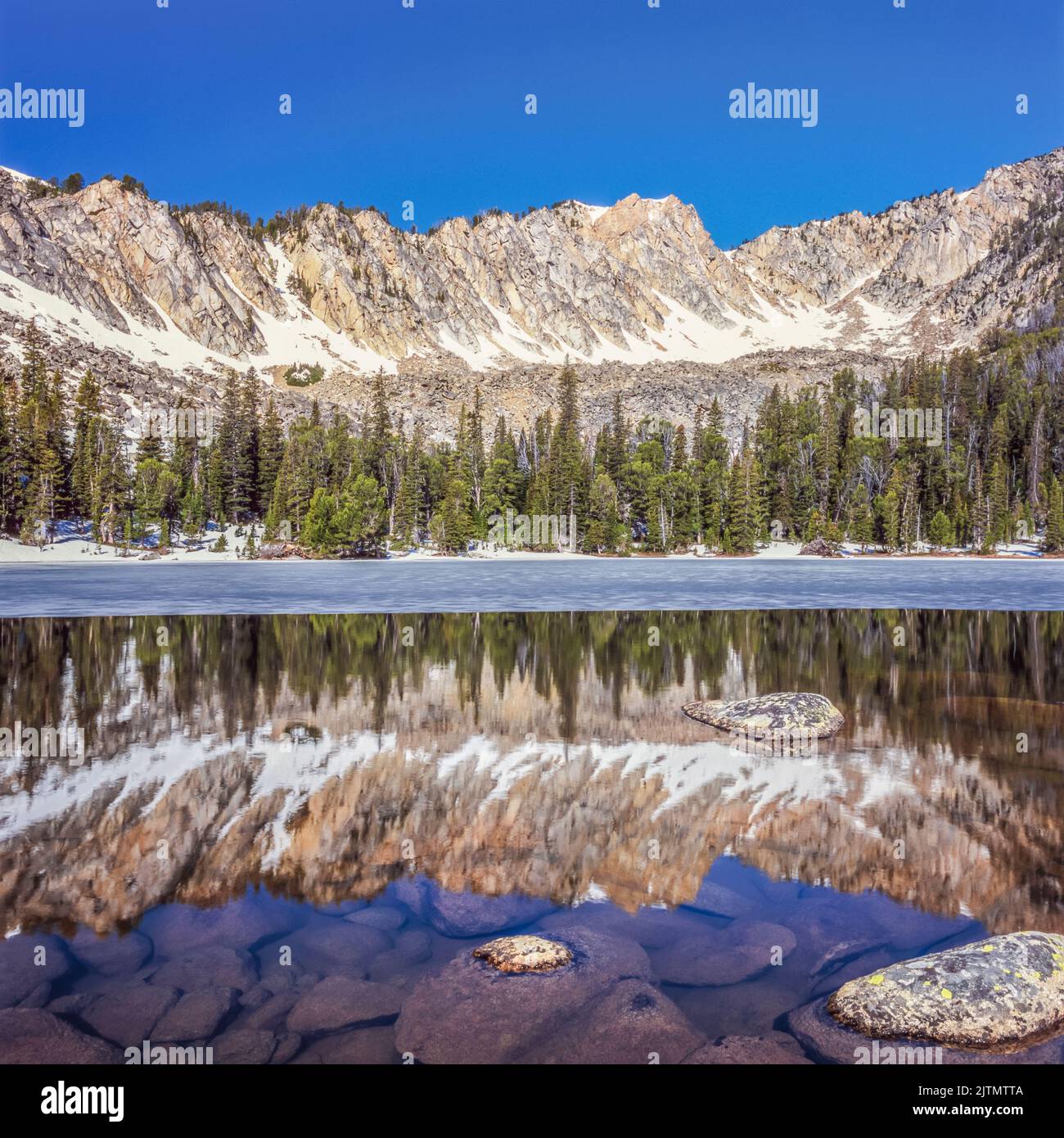 upper twin lake thawing in spring below a headwall in the pioneer ...
