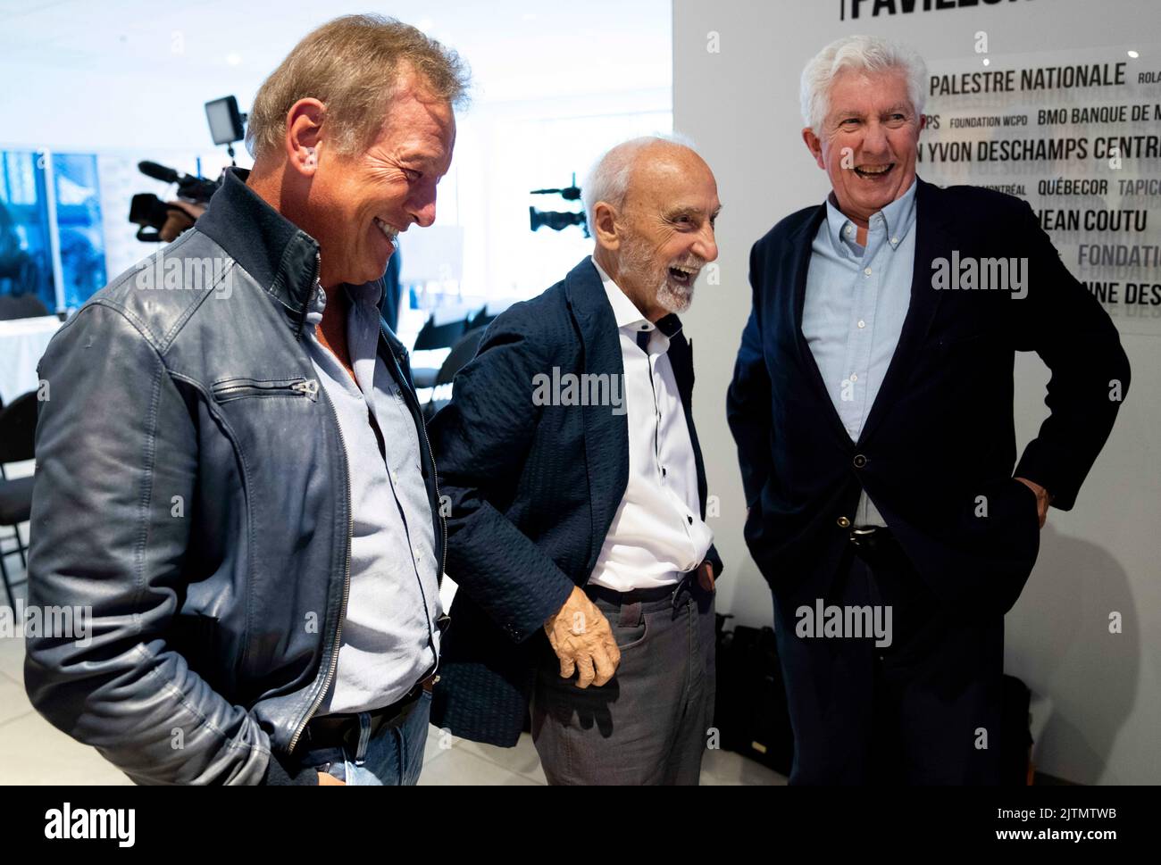 Comedian Yvon Deschamps shares a laugh with comedian Andre-Philippe ...