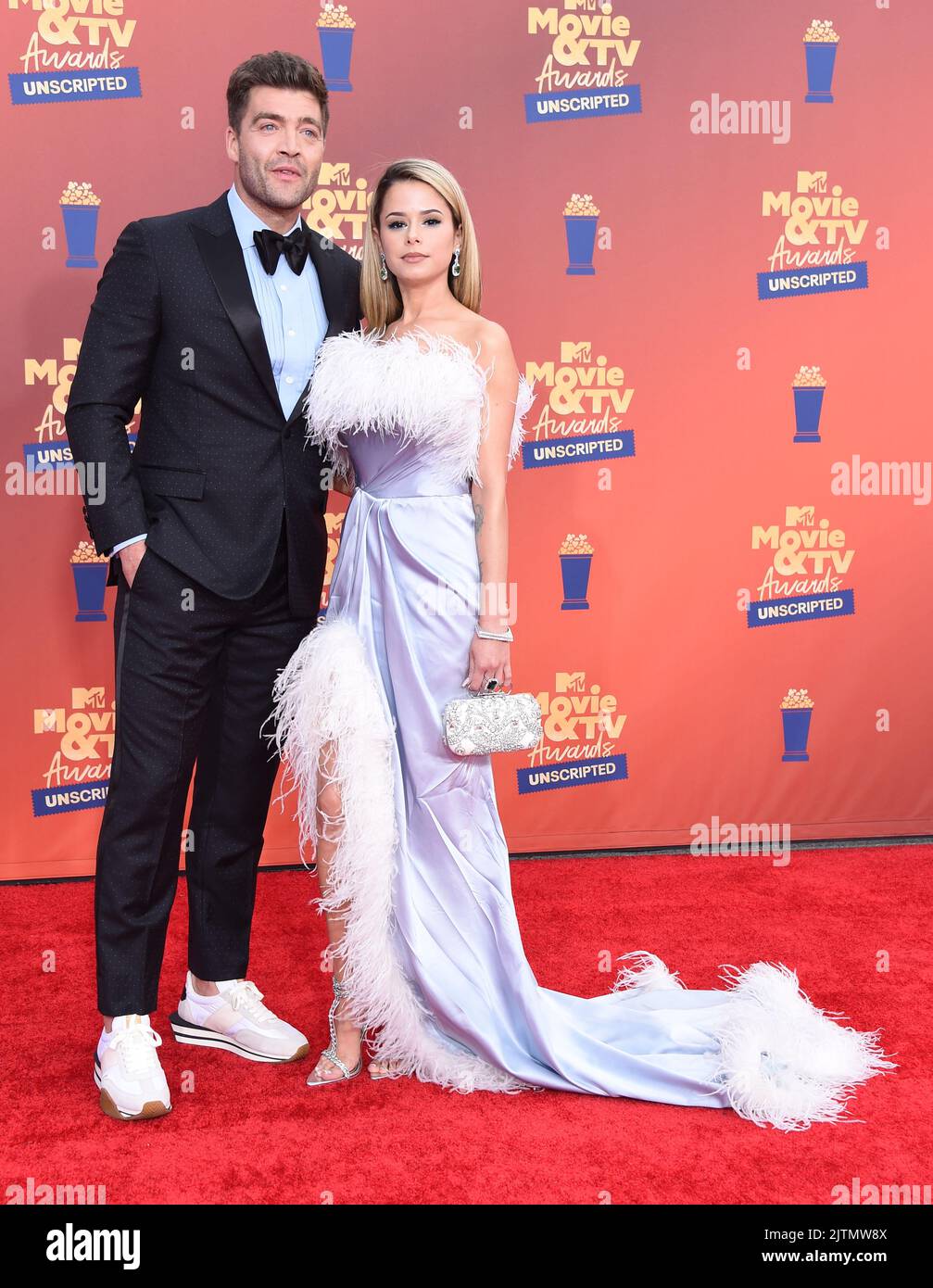 Chris Tamburello and Lilianet Solares arriving at the Movie & TV Awards ...