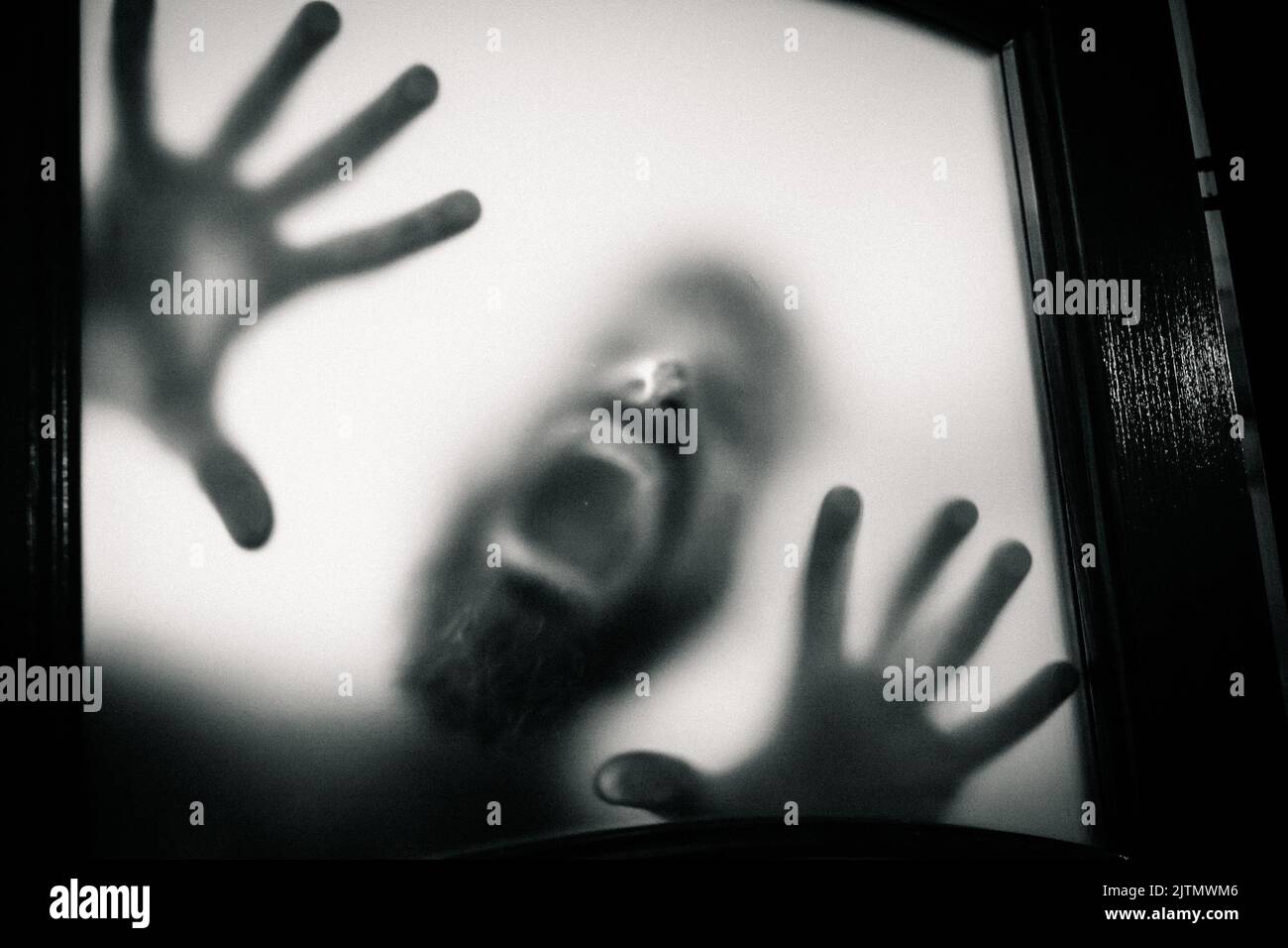 scary picture of hands behind glass, horror ghost behind door ...