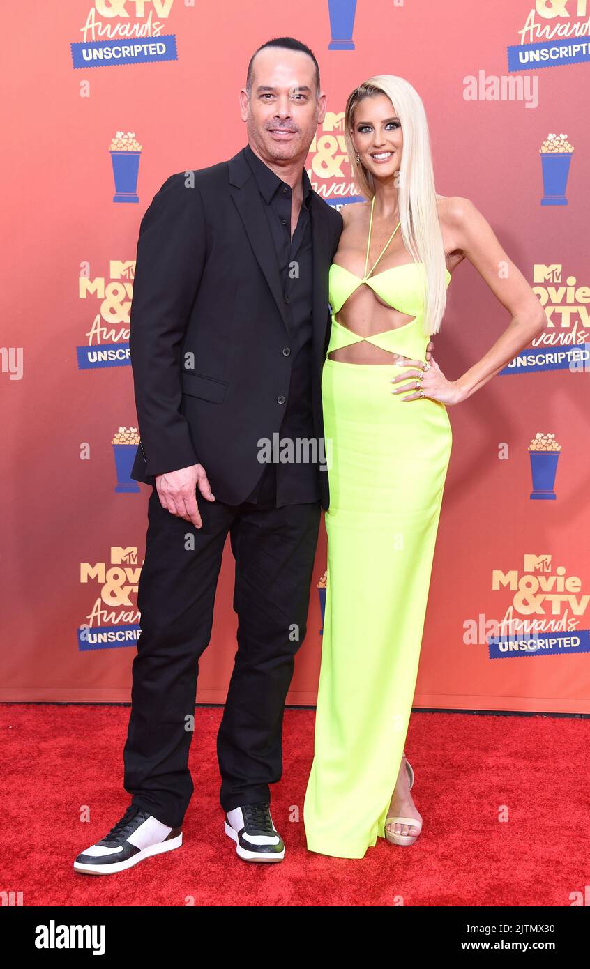 Adam DiVello and Emma Hernan arriving at the Movie & TV Awards ...
