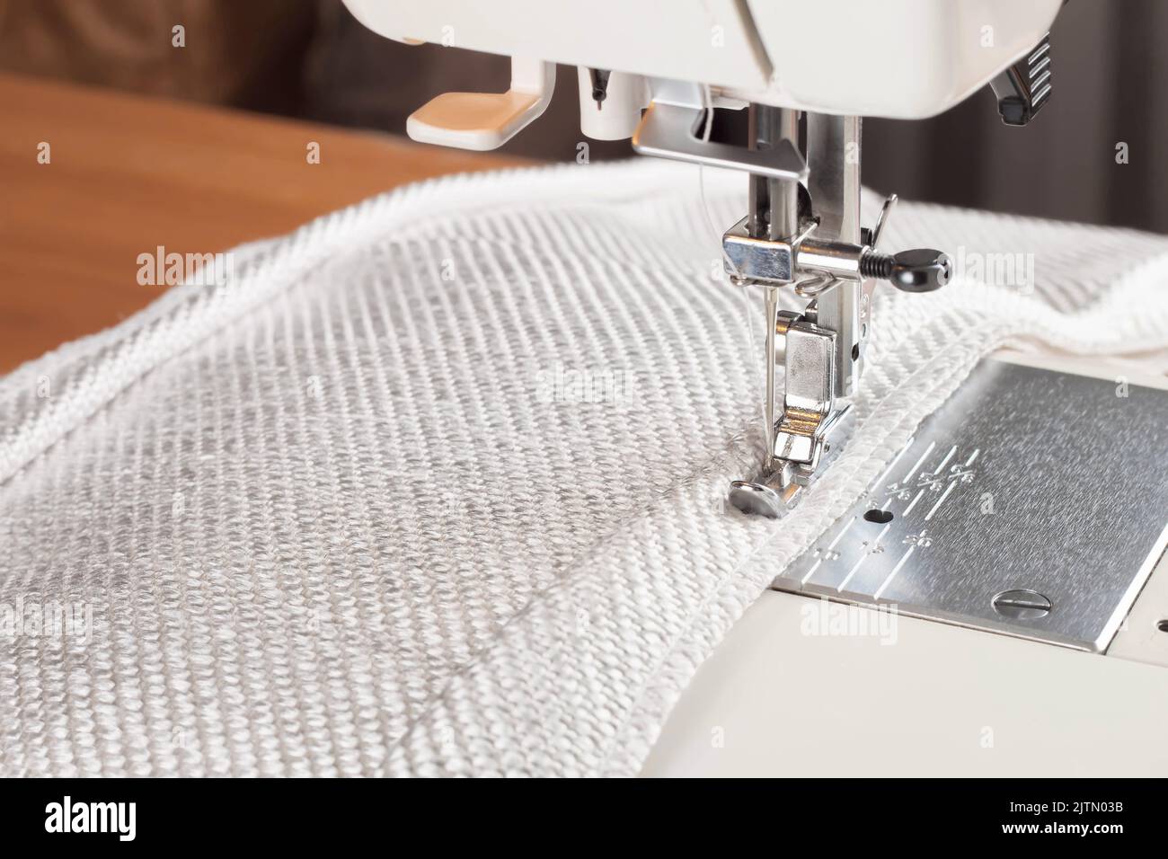 Professional equipment. Modern sewing machine with special pressure ...