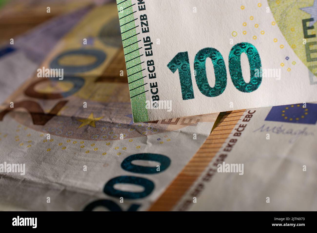 Background of euro bills. Fragment part of euro money Stock Photo - Alamy