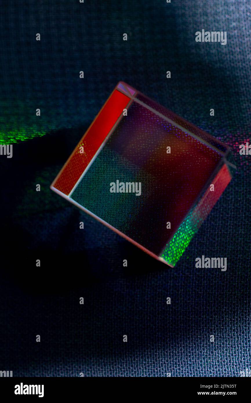 Luminous prism cubes refract light in different colors Stock Photo - Alamy